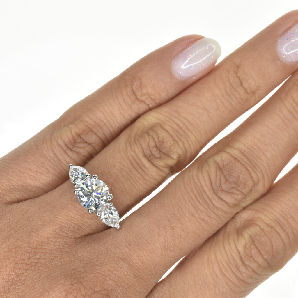 Trilogy Engagement Ring with Pear Side Diamonds – NIYA K